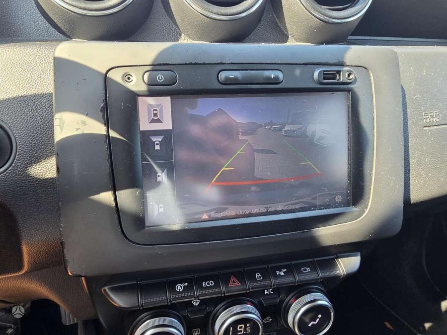 Yellow Dacia Duster 2018 in Taurage, with an engine capacity of 1.46 L and mileage of 190 thousand km for 8900 €, photo 15 on AUTOMOTO.COM.LV