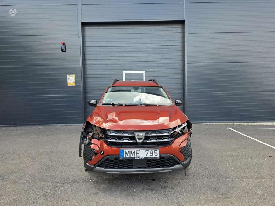 Brown Dacia Jogger 2023 in Kaunas, with an engine capacity of 1.00 L and mileage of 130 thousand km for 5800 €, photo 7 on AUTOMOTO.COM.LV