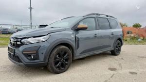 Grey Dacia Jogger 2023 in Siauliai, with an engine capacity of 1.60 L and mileage of 22 thousand km for 14450 €, photo 1 on AUTOMOTO.COM.LV