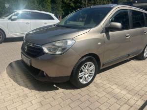 Brown Dacia Lodgy 2015 in Vilnius, with an engine capacity of 1.60 L and mileage of 263 thousand km for 3800 €, photo  on AUTOMOTO.COM.LV