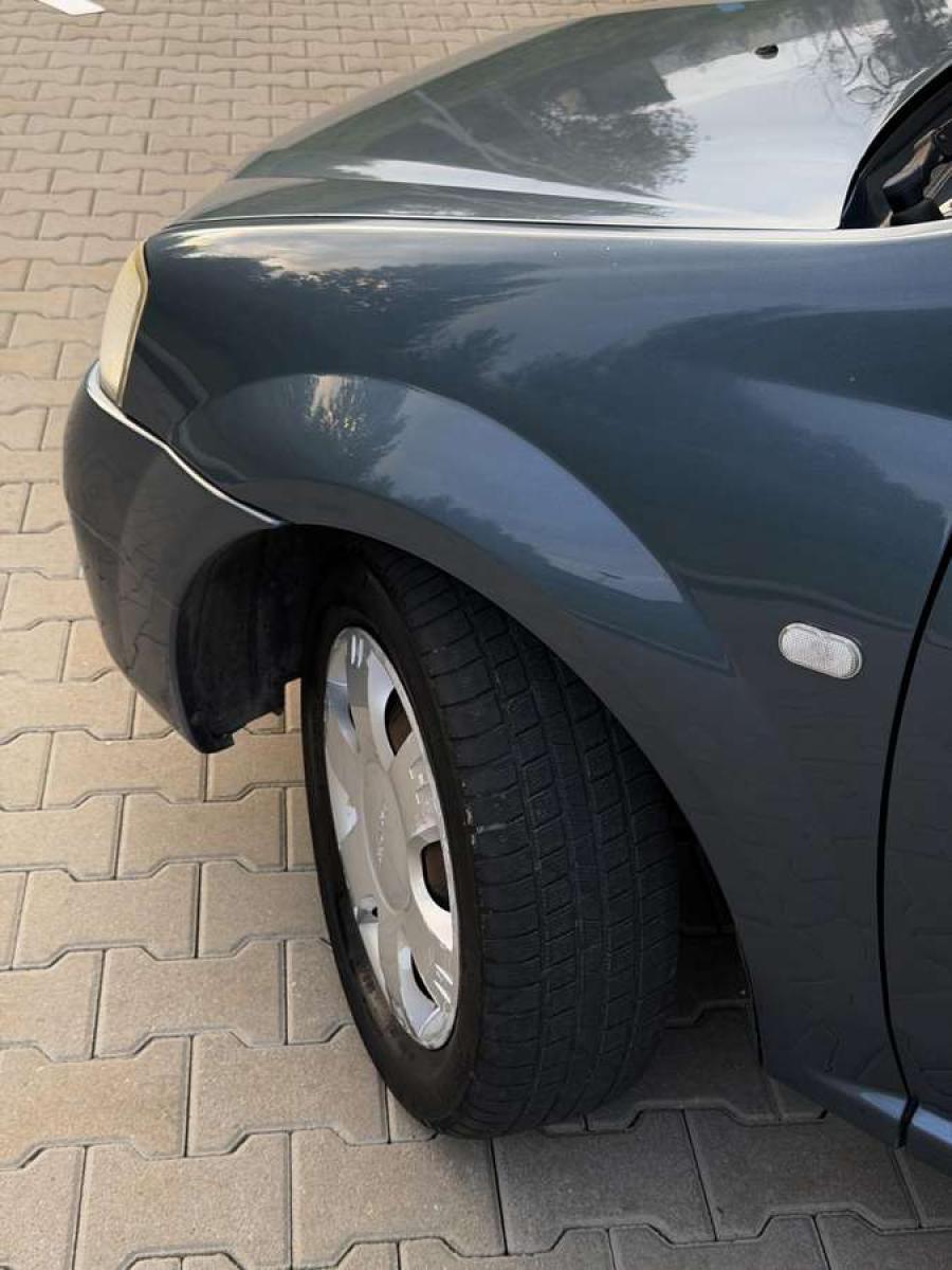 Zils Dacia Logan 2007 Viļņa, ar dzinēja tilpumu 1.60 L un nobraukumu 197 tūkst. km par 1490 €, foto 10 vietnē AUTOMOTO.COM.LV