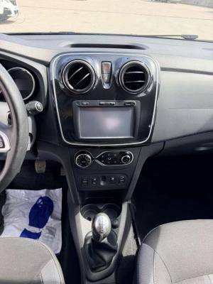 Brown Dacia Logan 2018 in Taurage, with an engine capacity of 0.90 L and mileage of 175 thousand km for 5999 €, photo 18 on AUTOMOTO.COM.LV