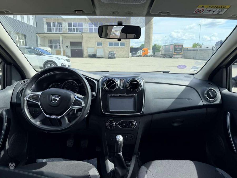 Brown Dacia Logan 2018 in Taurage, with an engine capacity of 0.90 L and mileage of 175 thousand km for 5999 €, photo 25 on AUTOMOTO.COM.LV