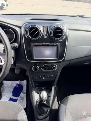 Brown Dacia Logan 2018 in Taurage, with an engine capacity of 0.90 L and mileage of 175 thousand km for 5499 €, photo 18 on AUTOMOTO.COM.LV