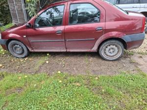 Red Dacia Logan 2006 in Balvi, with an engine capacity of 1.40 L and mileage of 191 thousand km for 930 €, photo 3 on AUTOMOTO.COM.LV