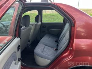 Red Dacia Logan 2006 in Jelgava, with an engine capacity of 1.40 L and mileage of 185 thousand km for 995 €, photo 11 on AUTOMOTO.COM.LV