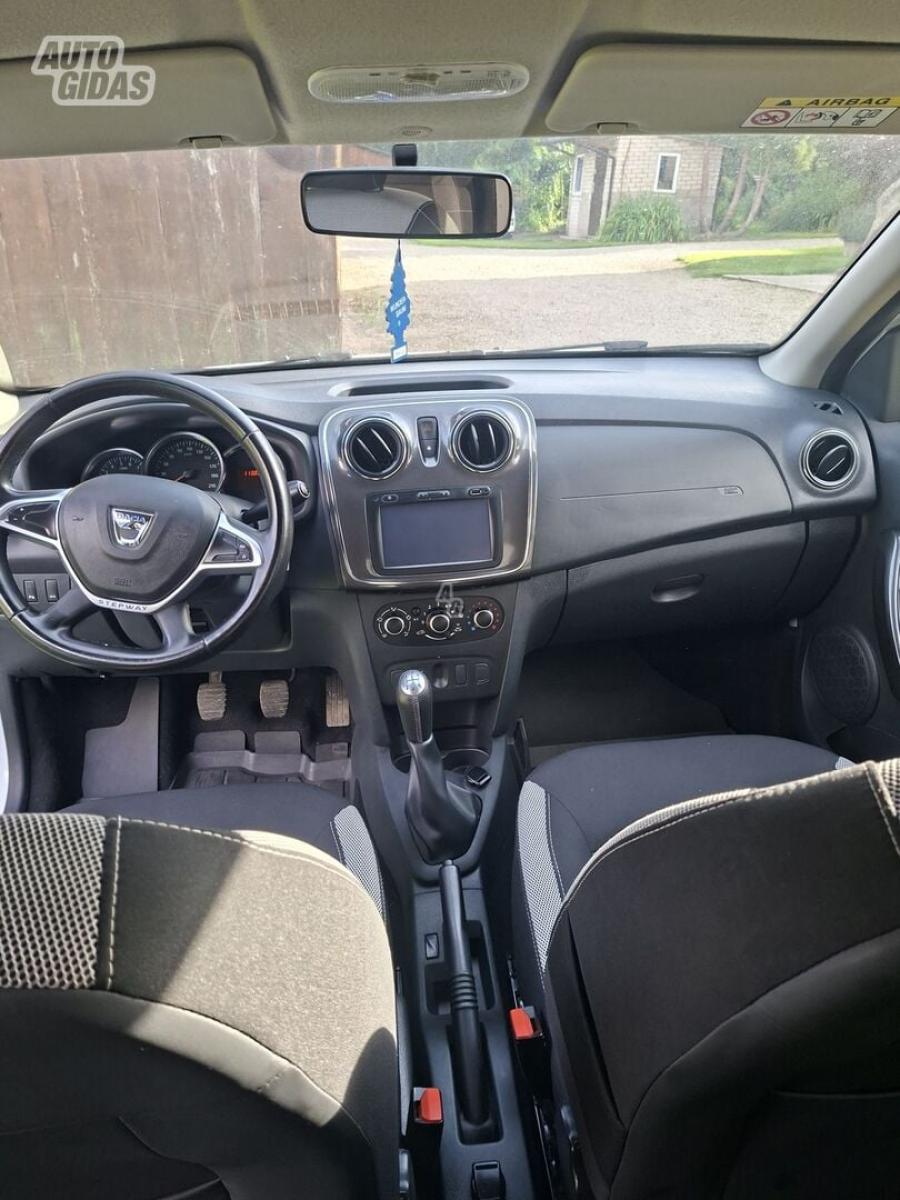White Dacia Logan 2018 in Radviliskis, with an engine capacity of 0.90 L and mileage of 114 thousand km for 5000 €, photo 9 on AUTOMOTO.COM.LV