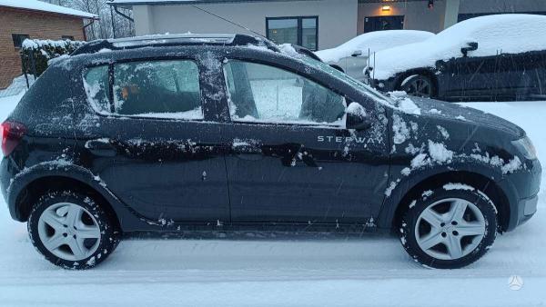 Black Dacia Sandero 2016 in Taurage, with an engine capacity of 0.90 L and mileage of 148 thousand km for 3700 €, photo 6 on AUTOMOTO.COM.LV