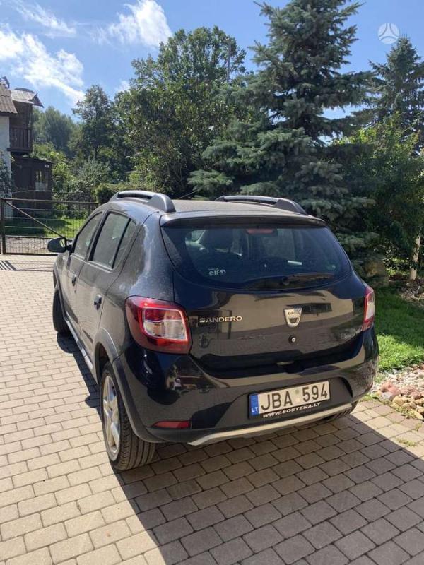 Black Dacia Sandero 2015 in Kaunas, with an engine capacity of 1.46 L and mileage of 122 thousand km for 3900 €, photo 1 on AUTOMOTO.COM.LV