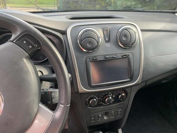 Black Dacia Sandero 2015 in Kaunas, with an engine capacity of 1.46 L and mileage of 122 thousand km for 3900 €, photo 5 on AUTOMOTO.COM.LV