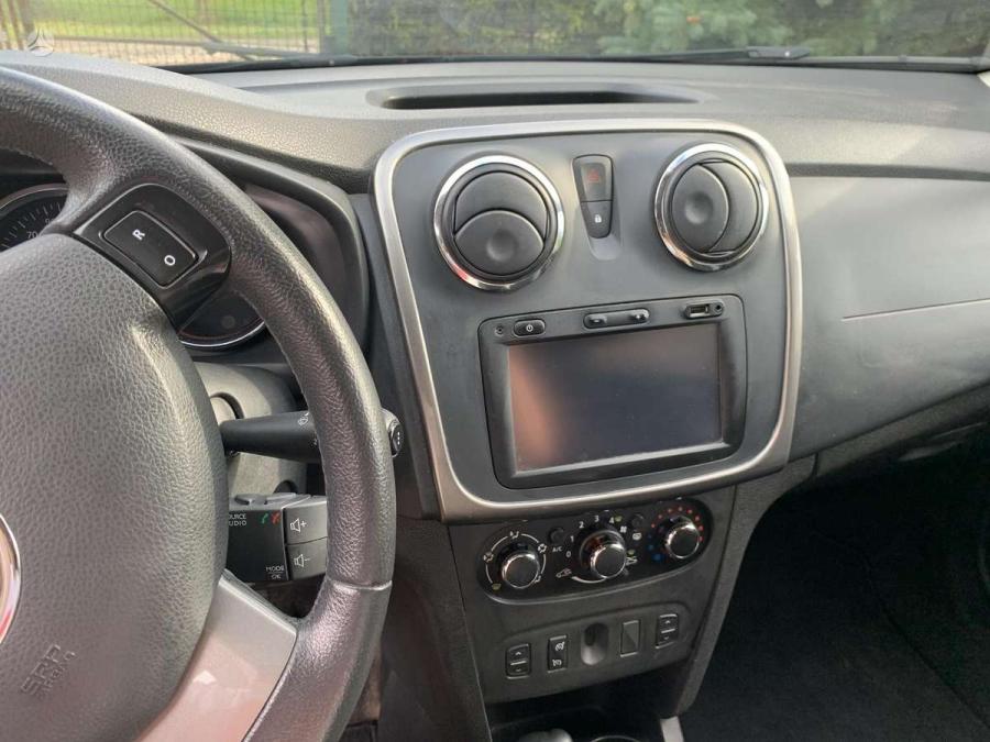 Black Dacia Sandero 2015 in Kaunas, with an engine capacity of 1.46 L and mileage of 122 thousand km for 3900 €, photo 5 on AUTOMOTO.COM.LV