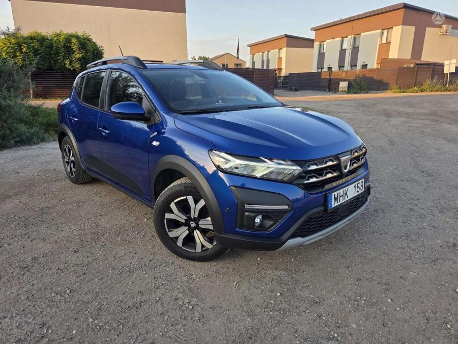 Blue Dacia Sandero 2022 in Kaunas, with an engine capacity of 1.00 L and mileage of 73 thousand km for 10900 €, photo 3 on AUTOMOTO.COM.LV