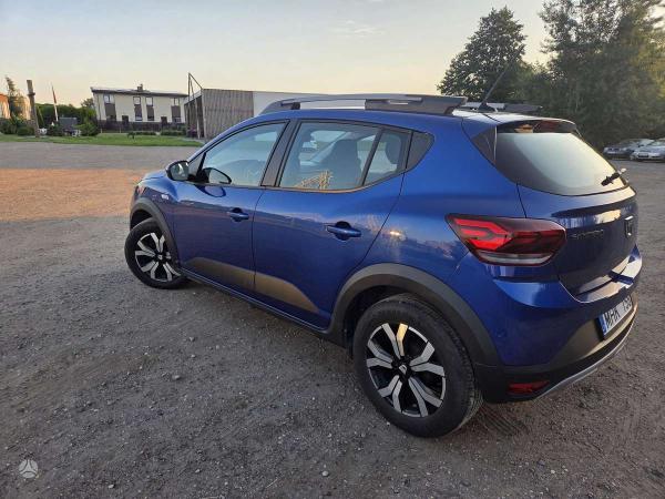 Blue Dacia Sandero 2022 in Kaunas, with an engine capacity of 1.00 L and mileage of 73 thousand km for 10900 €, photo 3 on AUTOMOTO.COM.LV