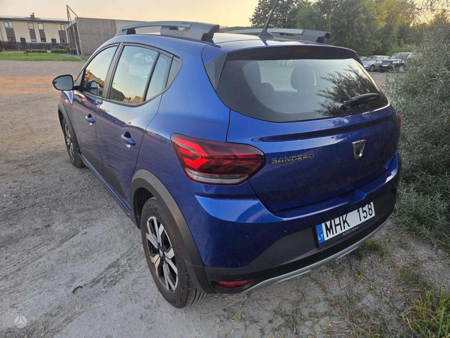 Blue Dacia Sandero 2022 in Kaunas, with an engine capacity of 1.00 L and mileage of 73 thousand km for 10900 €, photo 8 on AUTOMOTO.COM.LV