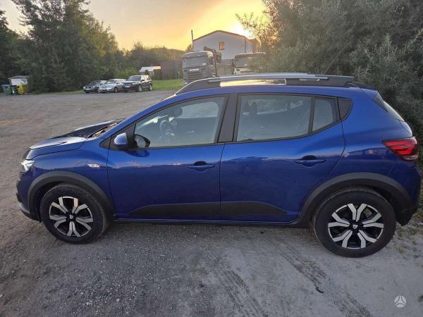 Blue Dacia Sandero 2022 in Kaunas, with an engine capacity of 1.00 L and mileage of 73 thousand km for 10900 €, photo 8 on AUTOMOTO.COM.LV