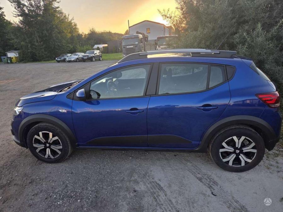 Blue Dacia Sandero 2022 in Kaunas, with an engine capacity of 1.00 L and mileage of 73 thousand km for 10900 €, photo 9 on AUTOMOTO.COM.LV