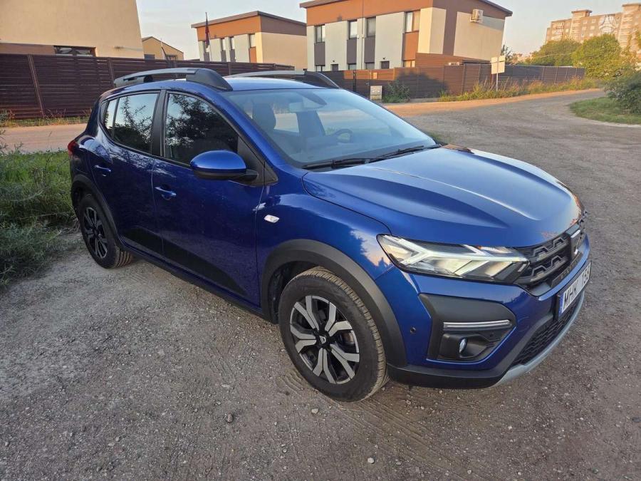 Blue Dacia Sandero 2022 in Kaunas, with an engine capacity of 1.00 L and mileage of 73 thousand km for 10900 €, photo 10 on AUTOMOTO.COM.LV