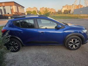 Blue Dacia Sandero 2022 in Kaunas, with an engine capacity of 1.00 L and mileage of 73 thousand km for 10900 €, photo 11 on AUTOMOTO.COM.LV