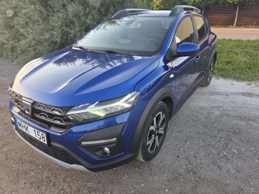 Blue Dacia Sandero 2022 in Kaunas, with an engine capacity of 1.00 L and mileage of 73 thousand km for 10900 €, photo 12 on AUTOMOTO.COM.LV