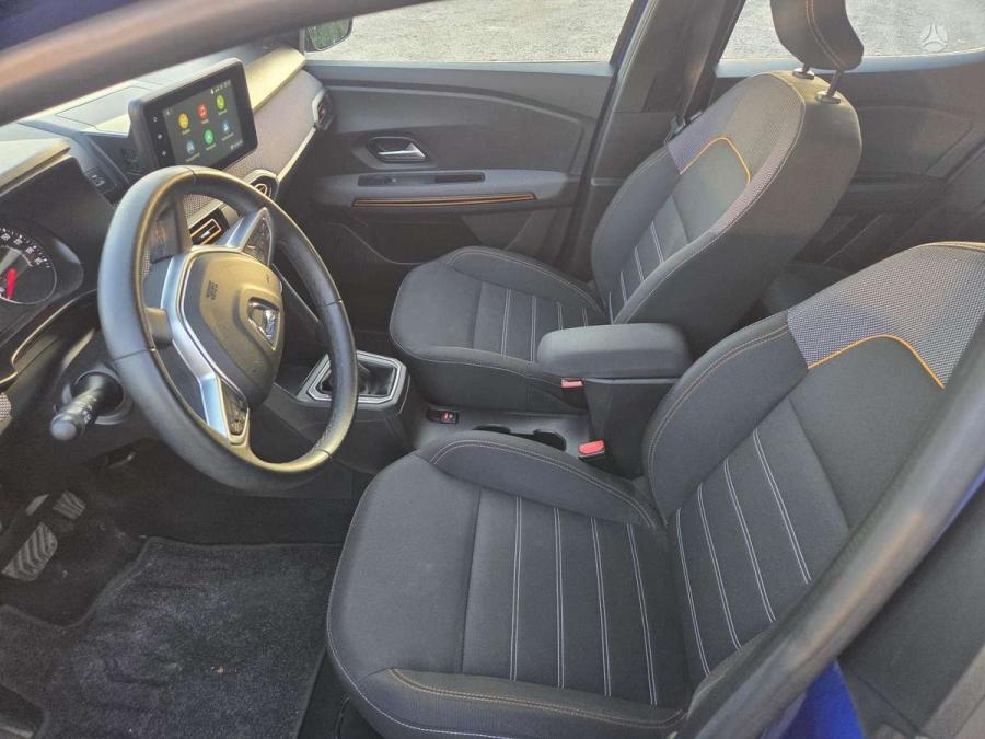 Blue Dacia Sandero 2022 in Kaunas, with an engine capacity of 1.00 L and mileage of 73 thousand km for 10900 €, photo 14 on AUTOMOTO.COM.LV