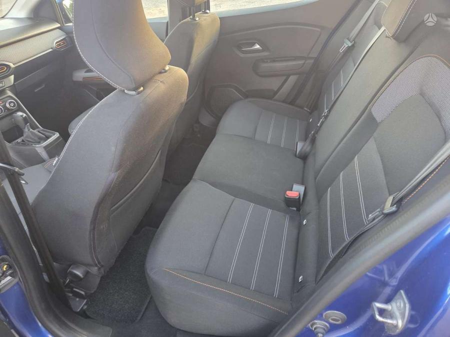 Blue Dacia Sandero 2022 in Kaunas, with an engine capacity of 1.00 L and mileage of 73 thousand km for 10900 €, photo 16 on AUTOMOTO.COM.LV