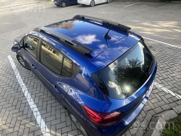 Blue Dacia Sandero 2023 in Riga, with an engine capacity of 1.00 L and mileage of 93 thousand km for 11200 €, photo 4 on AUTOMOTO.COM.LV