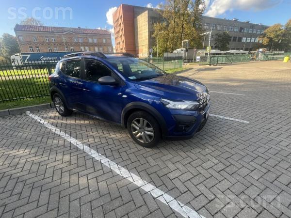 Blue Dacia Sandero 2023 in Riga, with an engine capacity of 1.00 L and mileage of 93 thousand km for 11200 €, photo 7 on AUTOMOTO.COM.LV