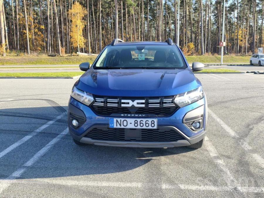 Blue Dacia Sandero 2023 in Riga, with an engine capacity of 1.00 L and mileage of 68 thousand km for 11100 €, photo 3 on AUTOMOTO.COM.LV