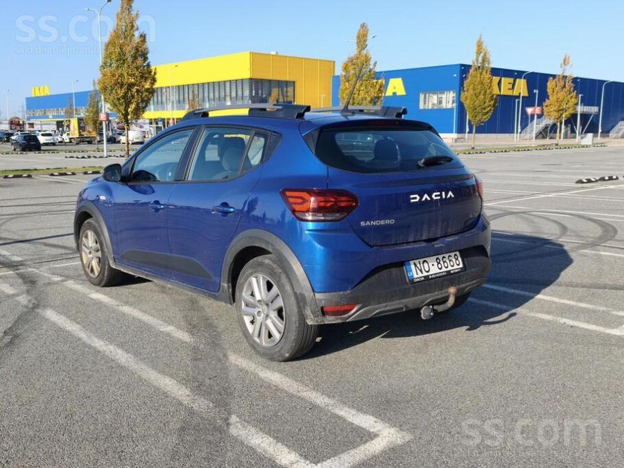Blue Dacia Sandero 2023 in Riga, with an engine capacity of 1.00 L and mileage of 68 thousand km for 11100 €, photo 4 on AUTOMOTO.COM.LV