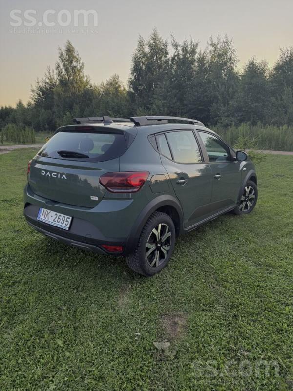 Green Dacia Sandero 2023 in Jelgava, with an engine capacity of 1.00 L and mileage of 62 thousand km for 14000 €, photo 2 on AUTOMOTO.COM.LV