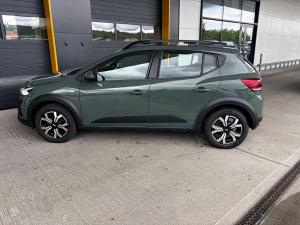 Green Dacia Sandero 2023 in Vilnius, with an engine capacity of 1.00 L and mileage of 60 thousand km for 12500 €, photo 4 on AUTOMOTO.COM.LV