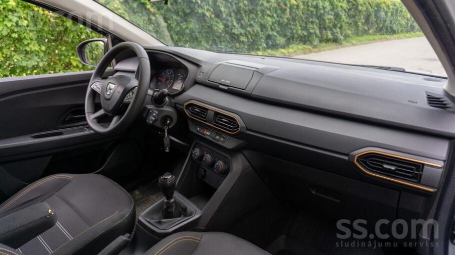Grey Dacia Sandero 2021 in Riga, with an engine capacity of 1.00 L and mileage of 108 thousand km for 8590 €, photo 12 on AUTOMOTO.COM.LV