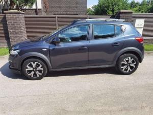 Grey Dacia Sandero 2022 in Kaunas, with an engine capacity of 1.00 L and mileage of 26 thousand km for 6700 €, photo 3 on AUTOMOTO.COM.LV