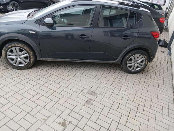 Grey Dacia Sandero 2023 in Taurage, with an engine capacity of 1.00 L and mileage of 17 thousand km for 5300 €, photo 4 on AUTOMOTO.COM.LV