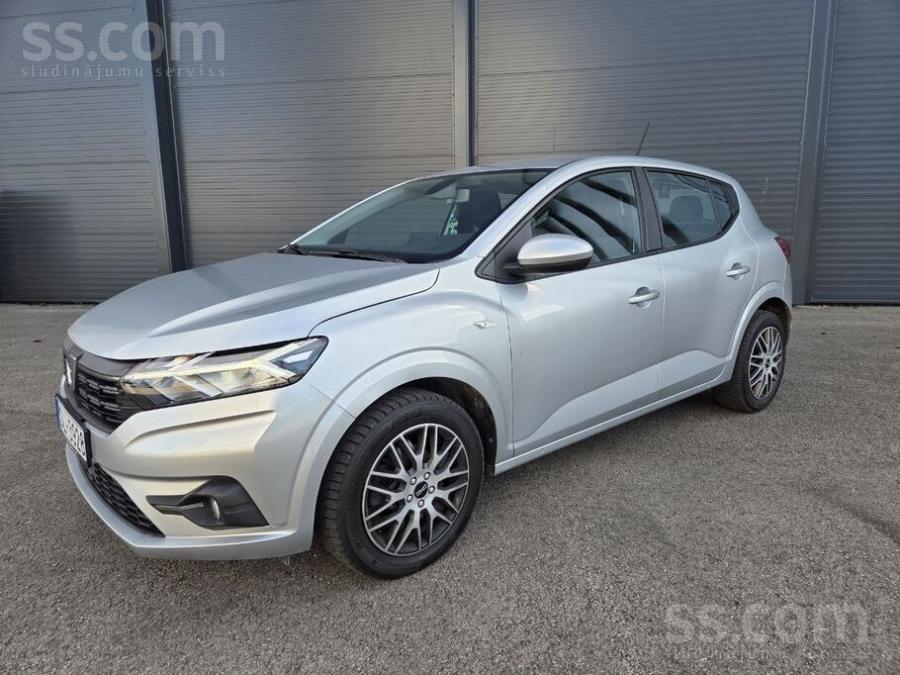 Grey Dacia Sandero 2021 in Riga, with an engine capacity of 1.00 L and mileage of 58 thousand km for 8200 €, photo 1 on AUTOMOTO.COM.LV