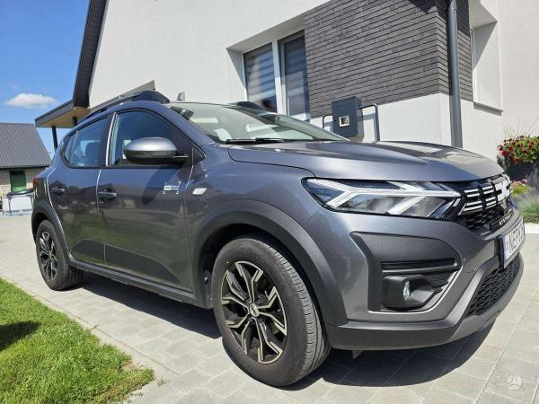 Grey Dacia Sandero 2024 in Jonava, with an engine capacity of 1.00 L and mileage of 25 thousand km for 13500 €, photo 1 on AUTOMOTO.COM.LV