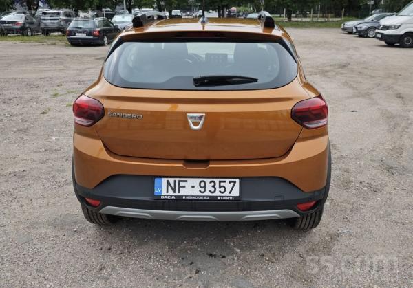 Orange Dacia Sandero 2022 in Riga, with an engine capacity of 1.00 L and mileage of 34 thousand km for 13000 €, photo 5 on AUTOMOTO.COM.LV