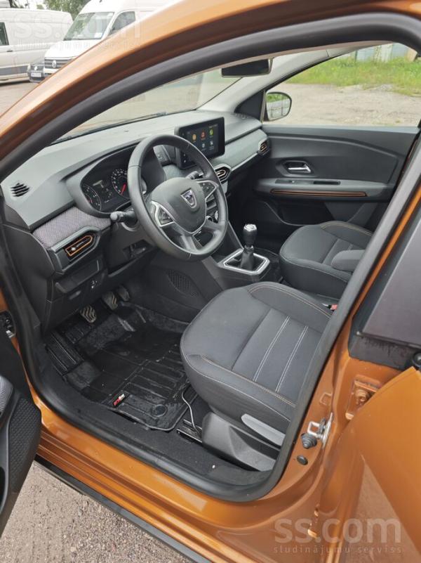 Orange Dacia Sandero 2022 in Riga, with an engine capacity of 1.00 L and mileage of 34 thousand km for 13000 €, photo 9 on AUTOMOTO.COM.LV