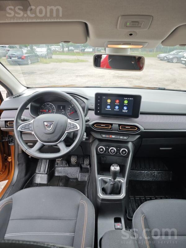 Orange Dacia Sandero 2022 in Riga, with an engine capacity of 1.00 L and mileage of 34 thousand km for 13000 €, photo 10 on AUTOMOTO.COM.LV
