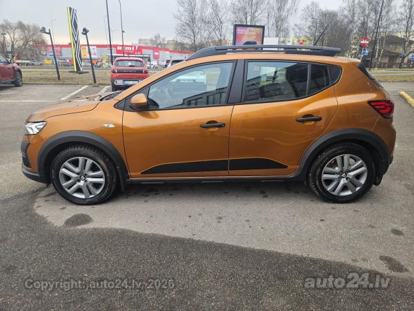 Orange Dacia Sandero 2021 in Tartu, with an engine capacity of 1.00 L and mileage of 61 thousand km for 9990 €, photo 3 on AUTOMOTO.COM.LV