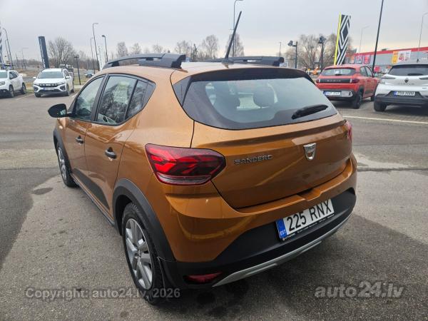 Orange Dacia Sandero 2021 in Tartu, with an engine capacity of 1.00 L and mileage of 61 thousand km for 9990 €, photo 4 on AUTOMOTO.COM.LV
