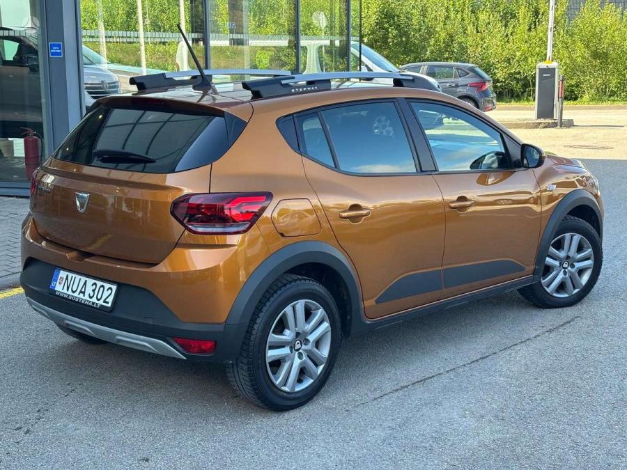 Orange Dacia Sandero 2021 in Siauliai, with an engine capacity of 1.00 L and mileage of 114 thousand km for 10500 €, photo 4 on AUTOMOTO.COM.LV