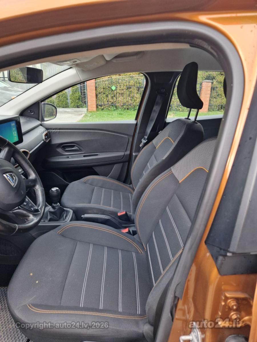 Orange Dacia Sandero 2022 in Tallinn, with an engine capacity of 1.00 L and mileage of 140 thousand km for 7500 €, photo 6 on AUTOMOTO.COM.LV
