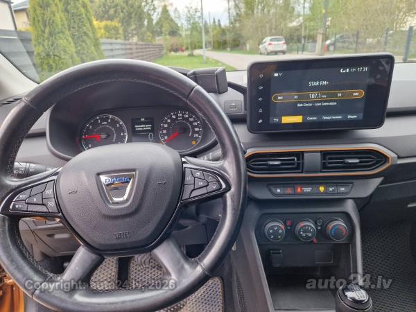 Orange Dacia Sandero 2022 in Tallinn, with an engine capacity of 1.00 L and mileage of 140 thousand km for 7500 €, photo 6 on AUTOMOTO.COM.LV