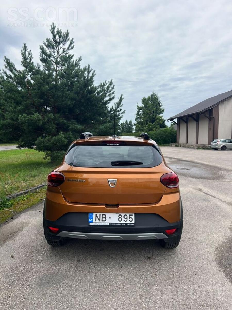 Orange Dacia Sandero 2022 in Jekabpils, with an engine capacity of 1.00 L and mileage of 55 thousand km for 11500 €, photo 4 on AUTOMOTO.COM.LV