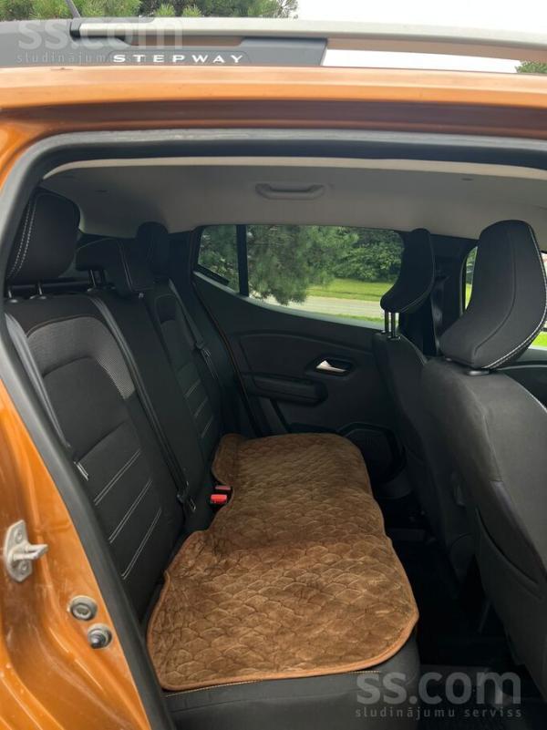 Orange Dacia Sandero 2022 in Jekabpils, with an engine capacity of 1.00 L and mileage of 55 thousand km for 11500 €, photo 7 on AUTOMOTO.COM.LV