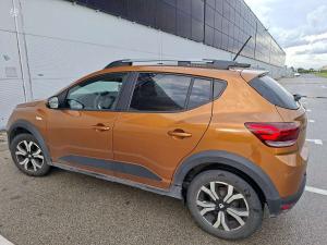 Orange Dacia Sandero 2022 in Panevezys, with an engine capacity of 1.00 L and mileage of 86 thousand km for 10500 €, photo 3 on AUTOMOTO.COM.LV