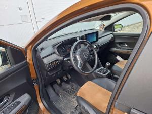 Orange Dacia Sandero 2022 in Panevezys, with an engine capacity of 1.00 L and mileage of 86 thousand km for 10500 €, photo 5 on AUTOMOTO.COM.LV