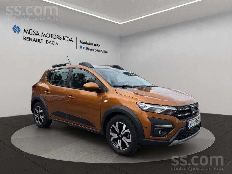 Orange Dacia Sandero 2022 in Riga, with an engine capacity of 1.00 L and mileage of 34 thousand km for 12295 €, photo 1 on AUTOMOTO.COM.LV