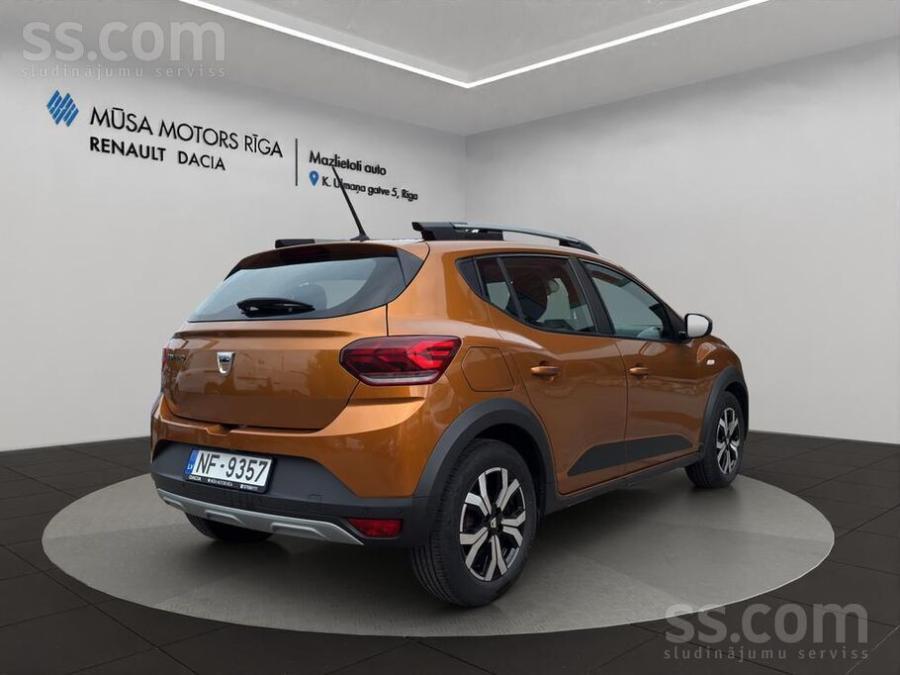 Orange Dacia Sandero 2022 in Riga, with an engine capacity of 1.00 L and mileage of 34 thousand km for 12295 €, photo 5 on AUTOMOTO.COM.LV